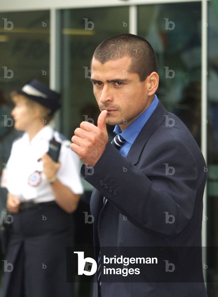 Image of Marcelo Delgado of Argentina gives the thumbs up as he