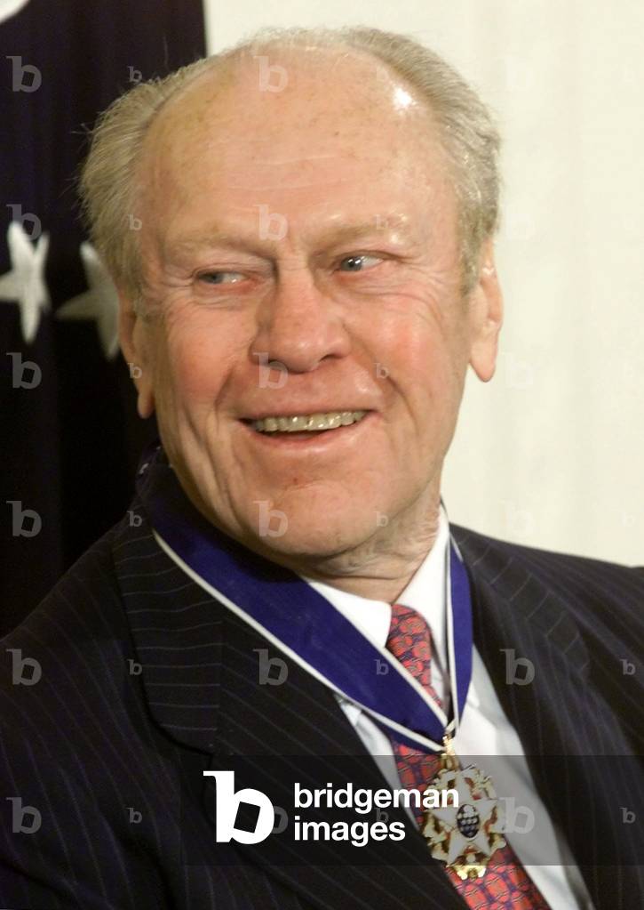 Image of Former President Gerald Ford smiles after receiving the Medal of