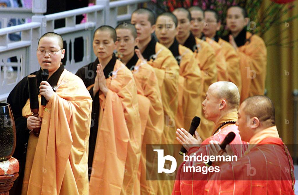 Image of TAIWANESE BUDDHIST MONKS AND NUNS PREFORM A RITUAL IN TAIPEI,