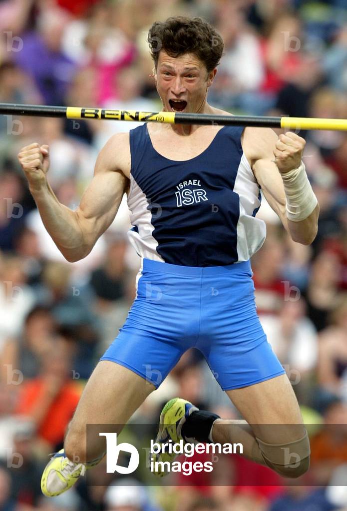 Image of Alex Averbukh of Israel jubilates after clearing the bar in