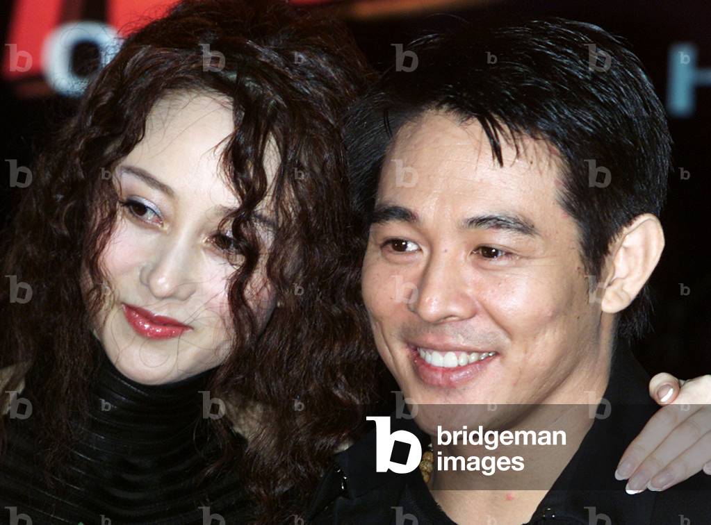 Image of Chinese martial arts star Jet Li (R) and his wife