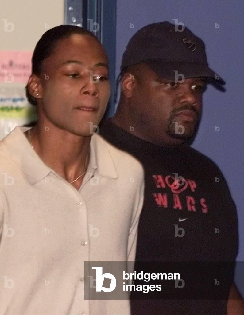 Image of USA shot put champion C.J. Hunter and his wife Marion