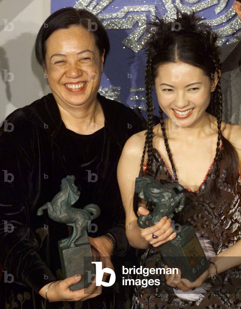 Image of ANN HUI AND RACHEL LEE POSE WITH THEIR AWARDS IN