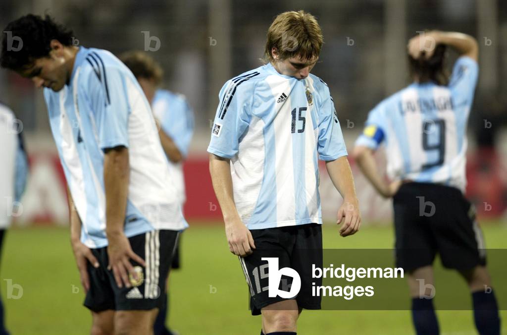 Image of ARGENTINE PLAYERS ARE DEJECTED AFTER DEFEAT BY BRAZIL AT FIFA