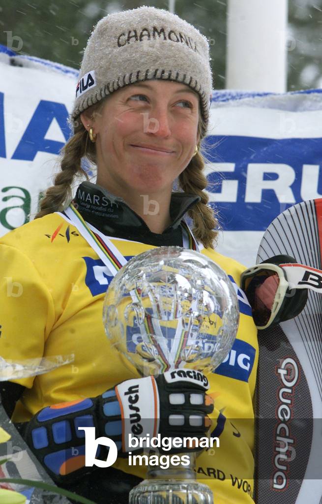 Image of FRANCE'S RUBY HOLDS WORLD CUP TROPHY AT SNOWBOARD WORLD CUP
