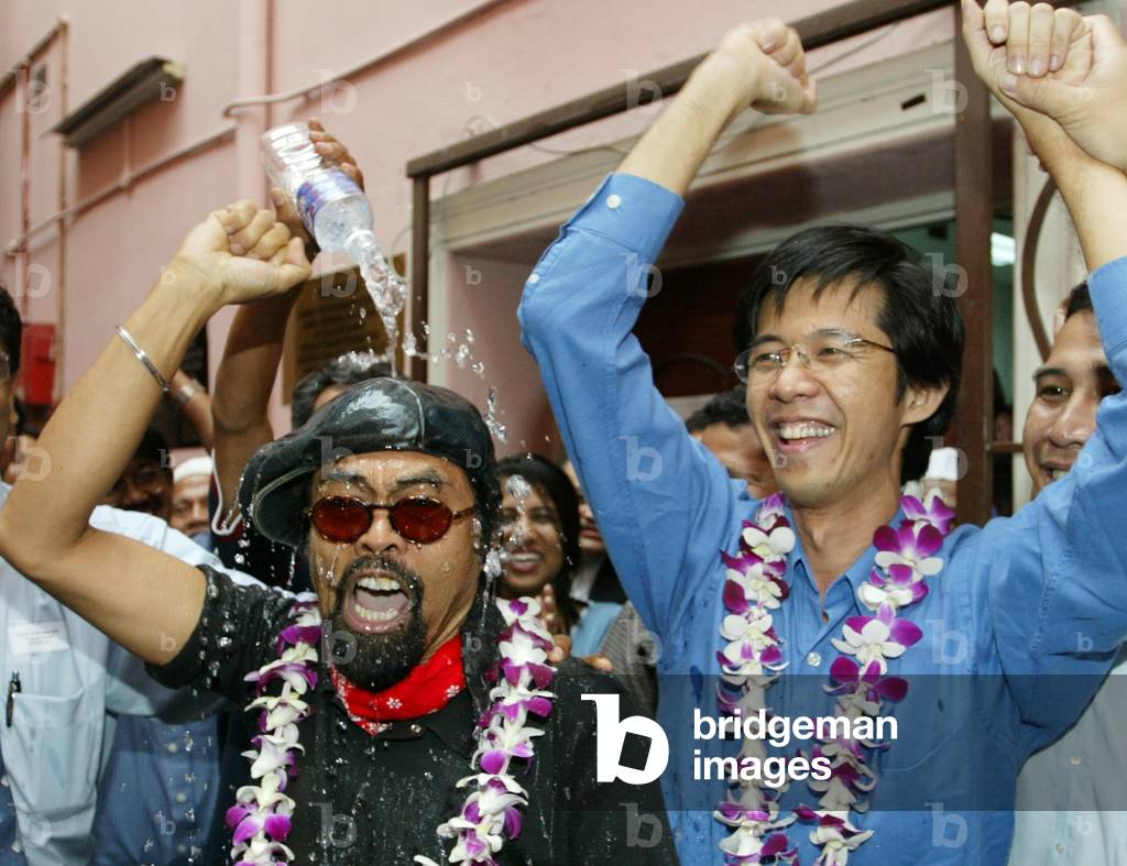 Image of MALAYSIAN OPPOSITION ACTIVISTS TIAN CHUA AND HISHAMUDDIN SHOUT ...