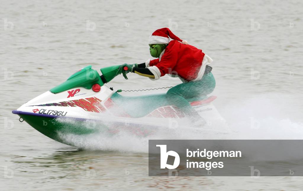 Image of The Grinch speeds on his jet-ski on the Potomac River