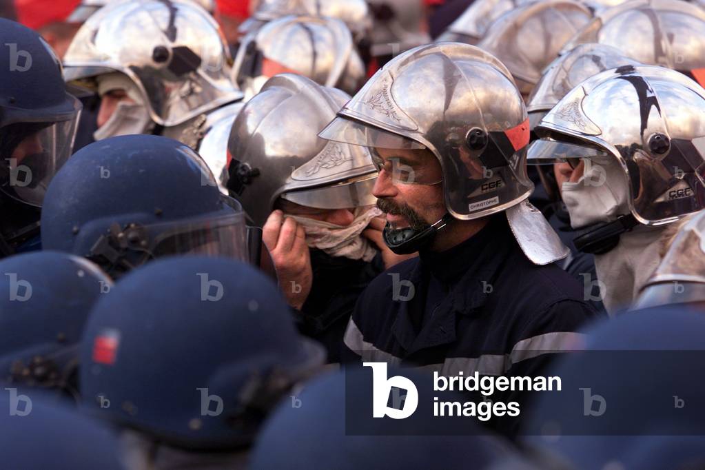 Image of FRENCH RIOT POLICE LINE UP IN A FACE OFF AGAINST