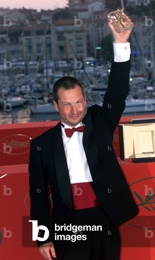 Image of Danish director Lars Von Trier holds his Palme d'Or (Golden