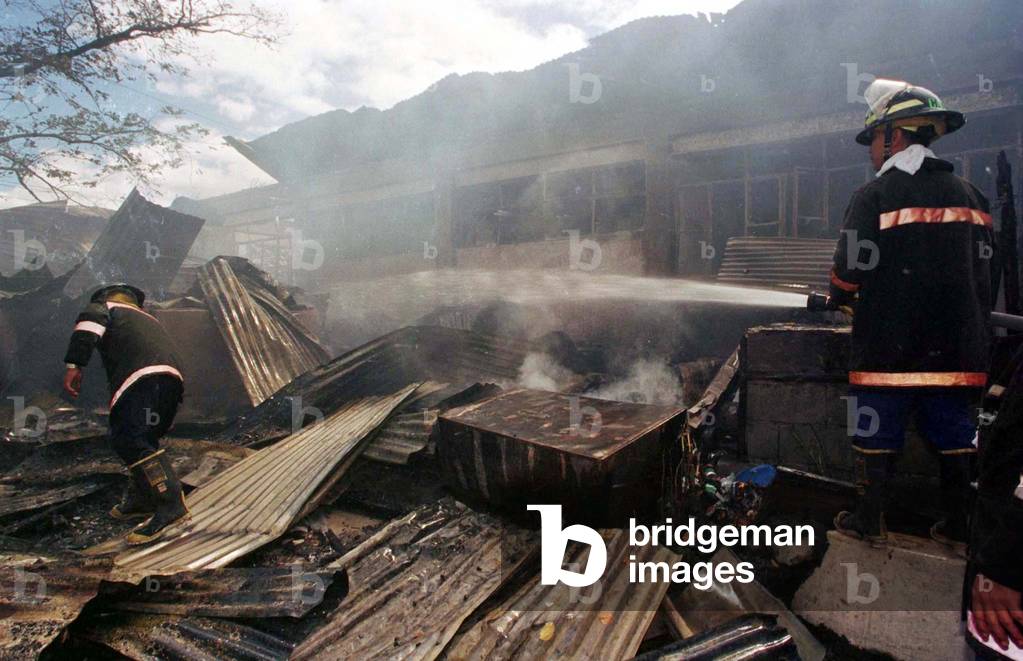 Image of A FILIPINO FIREMAN FIGHTS A FIRE AT A GENERAL HOSPITAL