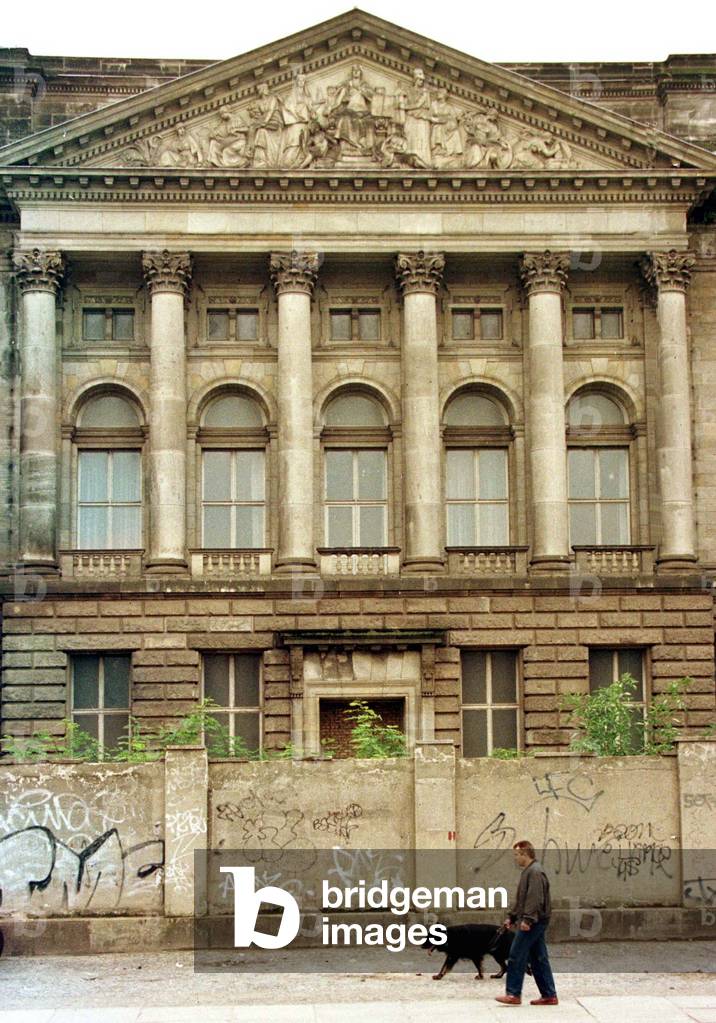 Image of A man walks past the facade of the Prussian "Herrenhaus",