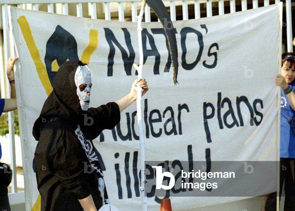 Image of A Mother Earth anti nuclear activist dressed as a skeleton