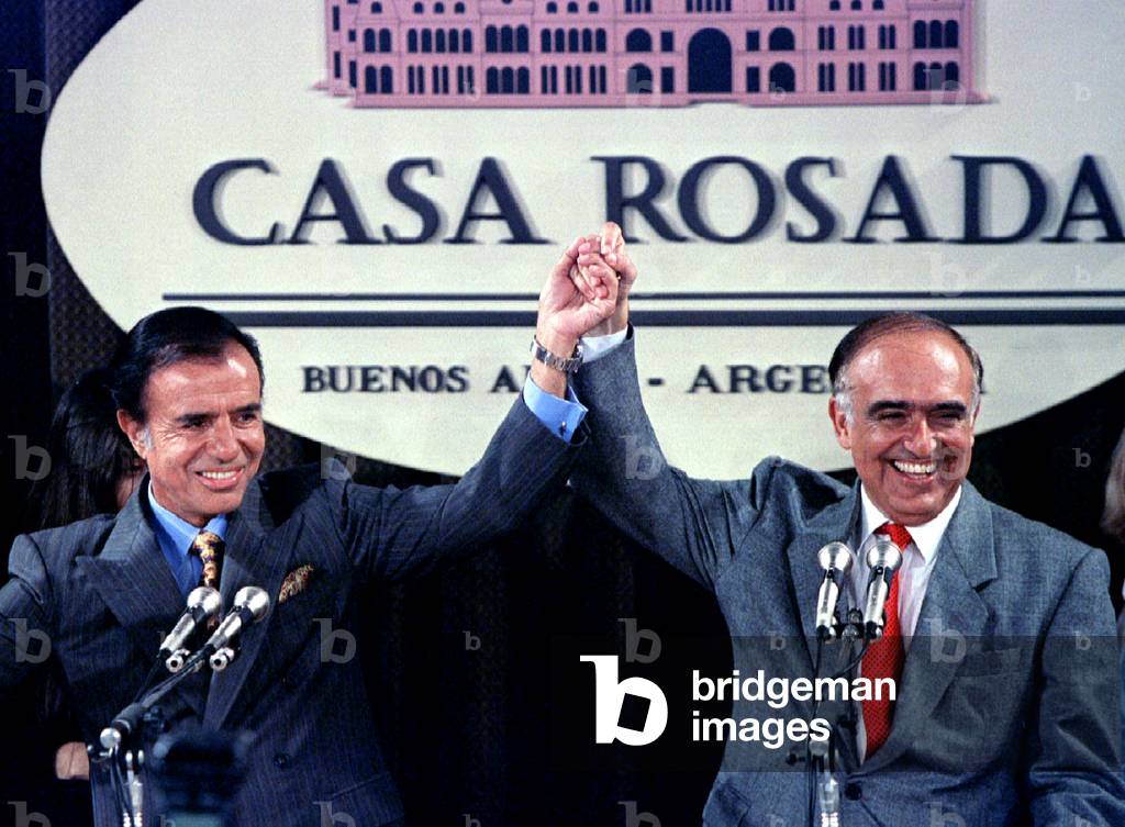 Image of Argentine President Carlos Menem (L) and his runningmate ...