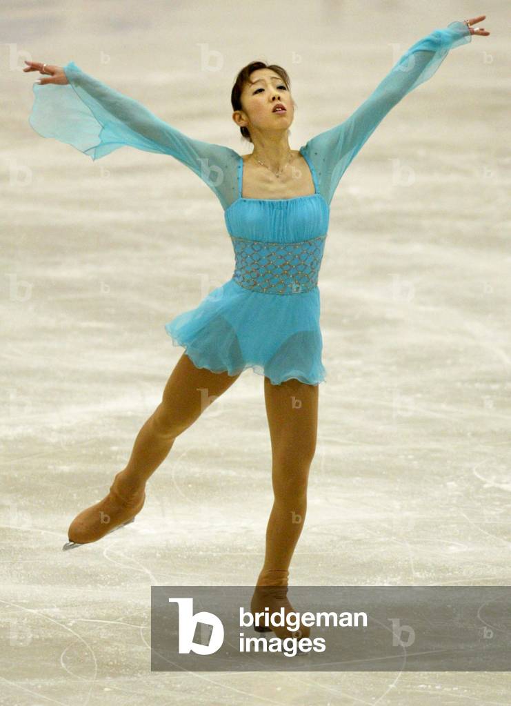 Image of JAPAN'S SUGURI PERFORMS ON WAY TO WIN GOLD AT FIGURE