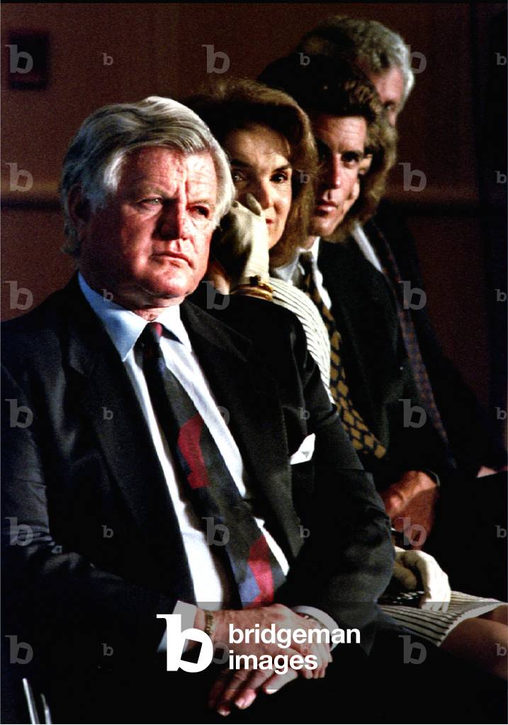 Image of Jacqueline Kennedy Onassis (C), sitting between US Senator Ted ...
