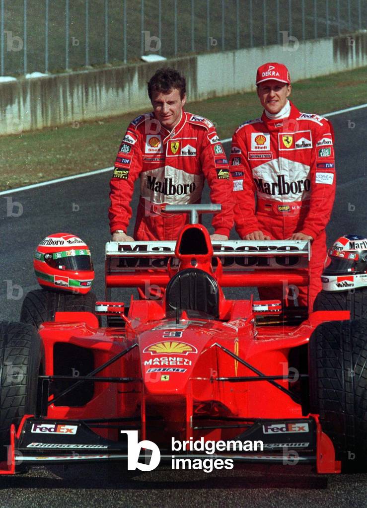 Image of German Formula one driver Michael Schumacher (R) and his teammate
