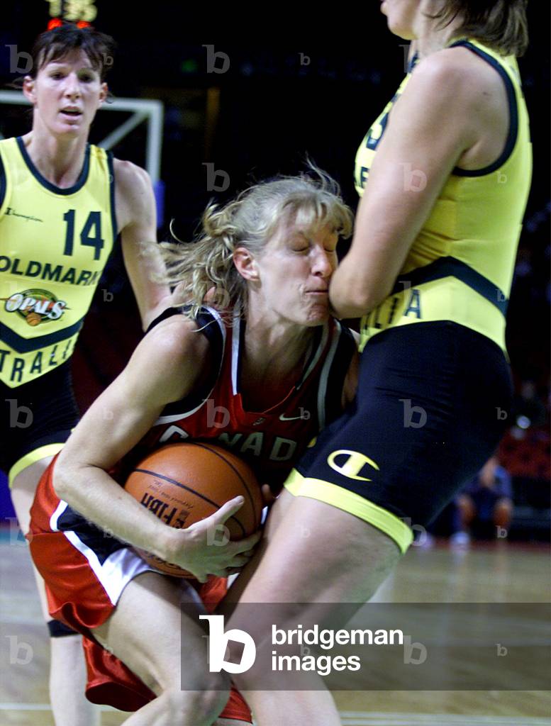 Image of CANADA'S MICHELLE HENDRY COLLIDES INTO AUSTRALIA'S JENNY ...