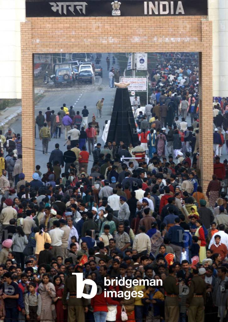 Image of A HUGE CROWD OF INDIAN RESIDENTS GATHER TO WATCH THE