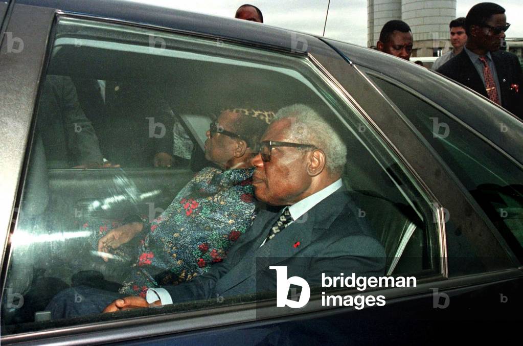 Image of Zairean President Mobutu Sese Seko, (left inside car), and Congo