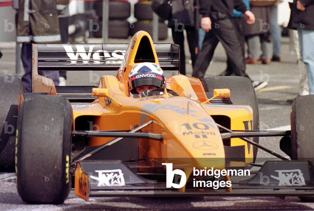 Image of Scotish Formula One driver David Coulthard comes out for a