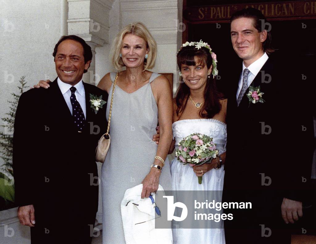 Image of Swiss professional cyclist Jorg Muller (R) poses with his wife