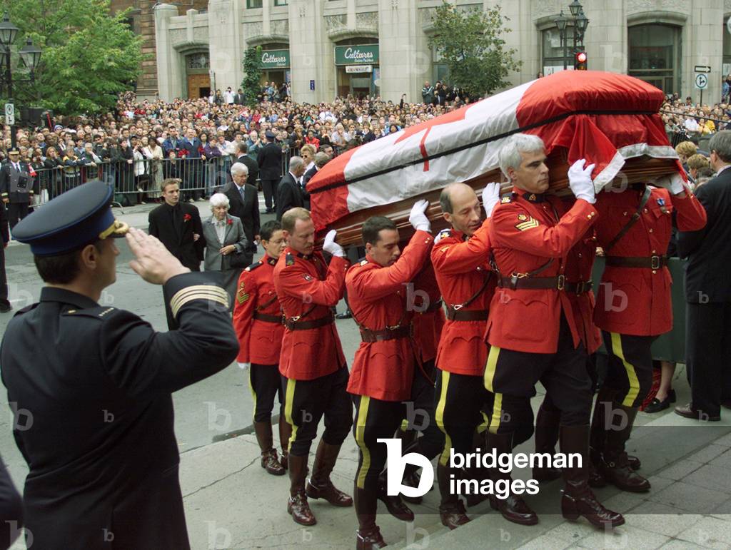 Image of SACHA TRUDEAU AND SUZETTE ROULEAU FOLLOW CASKET INTO NOTRE DAME