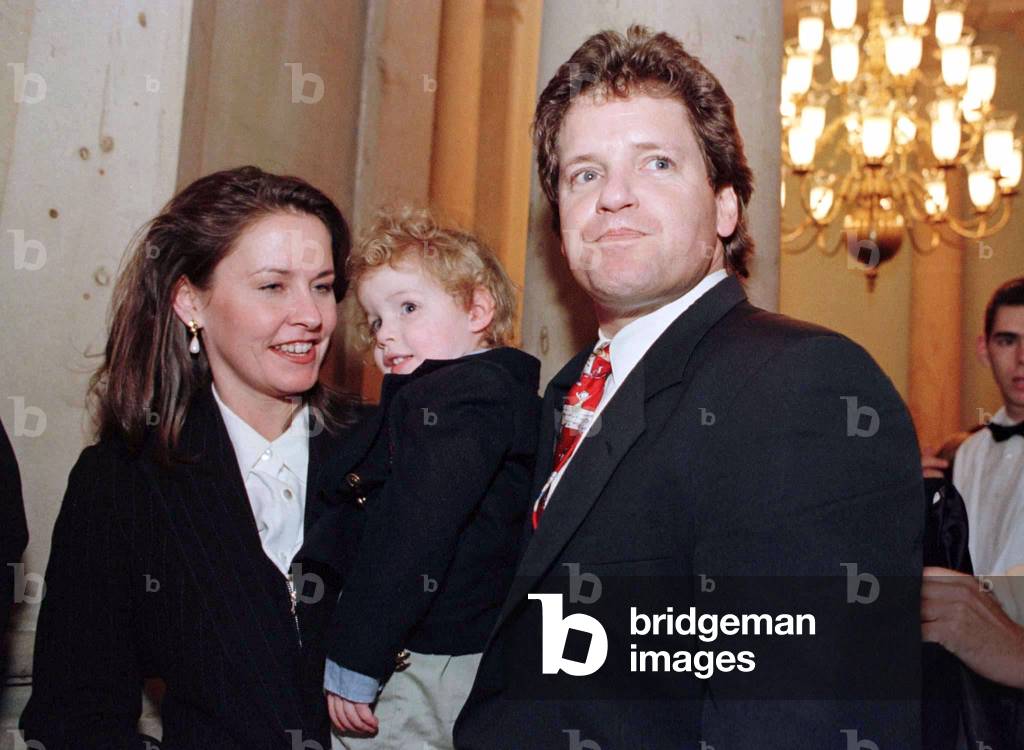 Image of Roger Clinton and his wife Molly hold their son Tyler