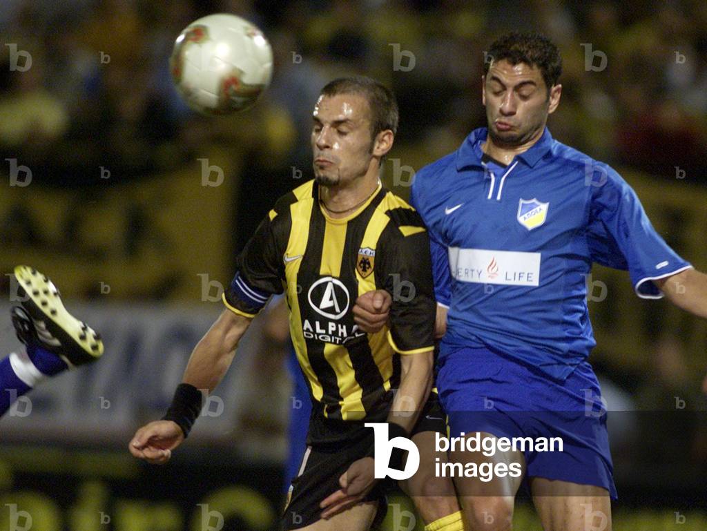 Image of AEK ATHENS NIKOLAIDES STRUGGLES FOR THE BALL AGAINST APOEL ...