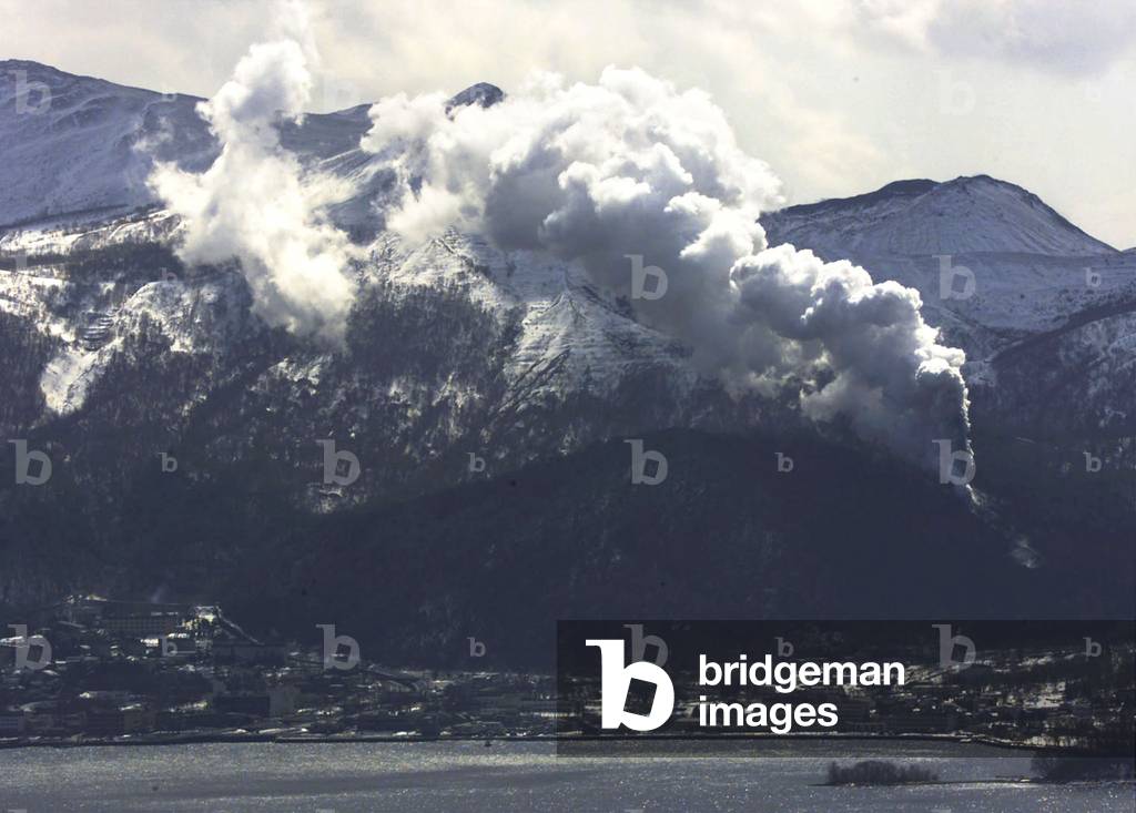 Image of SMOKE BILLOWS OVER RESORT TOWN OF TOYAKO FOLLOWING VOLCANO ...