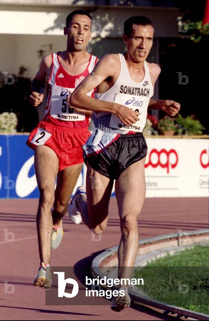 Image of Algerian Nourredine Morceli (front) fails his assault to break the