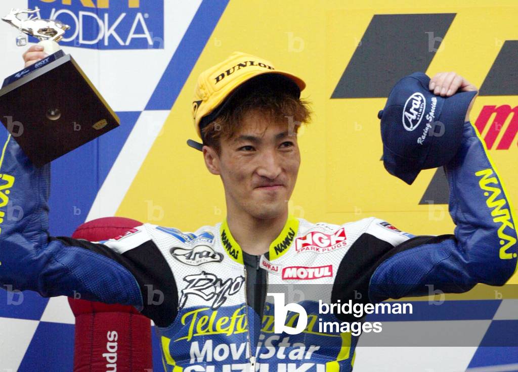 Image of Japanese rider Akira Ryo celebrates after placing second in the