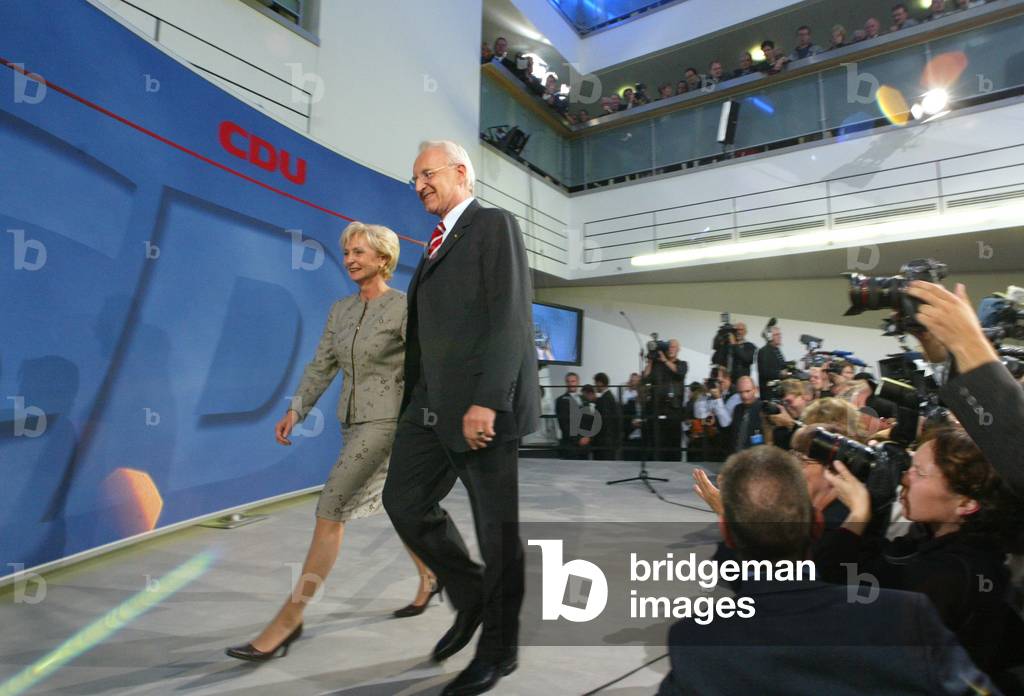 Image of CONSERVATIVE TOP CANDIDATE STOIBER AND HIS WIFE KARIN WALK AWAY