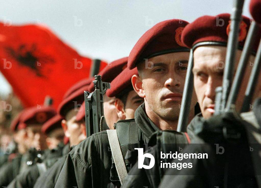 Image of The members of Kosovo Liberation Army (KLA) special unit parade