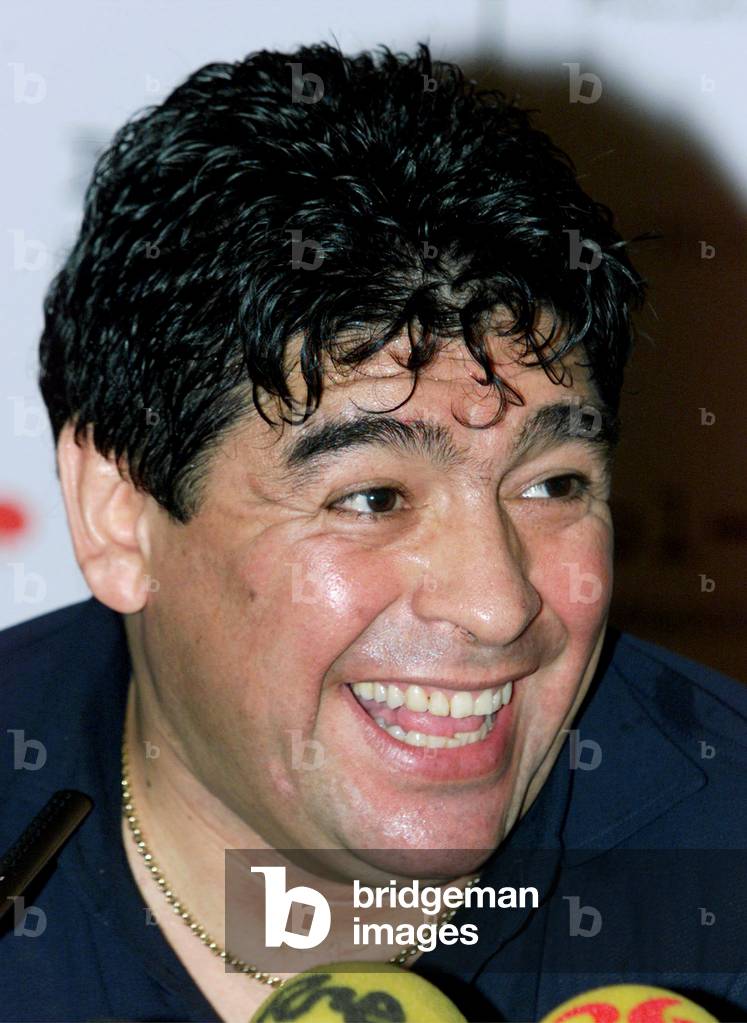 Image of Argentine soccer legend Diego Armando Maradona smiles during a ...