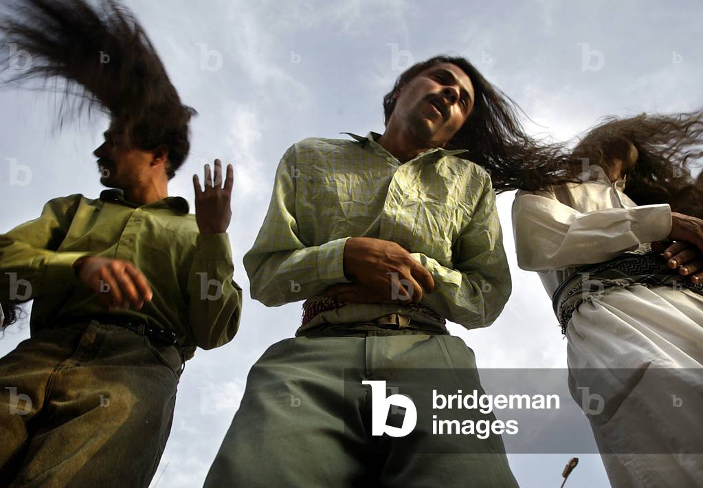 Image of Waving with their long hair outside their tekiyah in Baghdad,