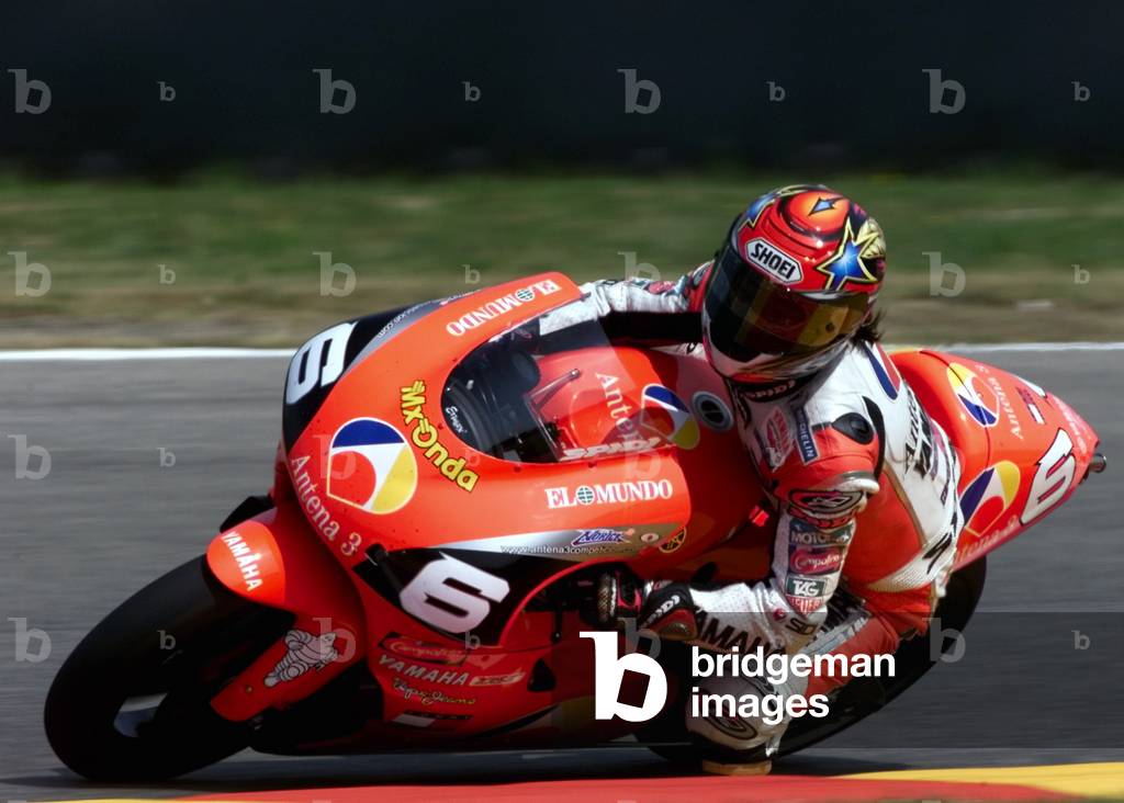 Image of YAMAHA'S JAPANESE RIDER NORICK ABE TAKE A CURVE DURING FREE