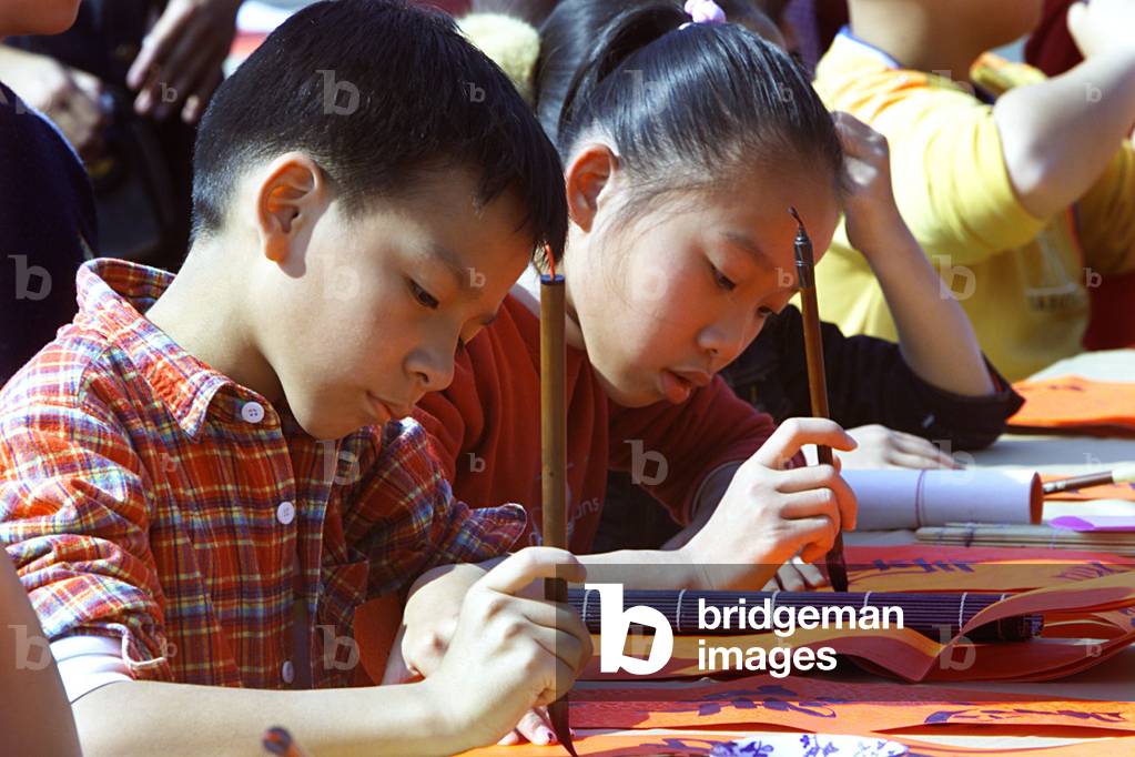Image of TAIWANESE PRIMARY SCHOOL STUDENTS WRITE POEMS IN TRADITIONAL ...