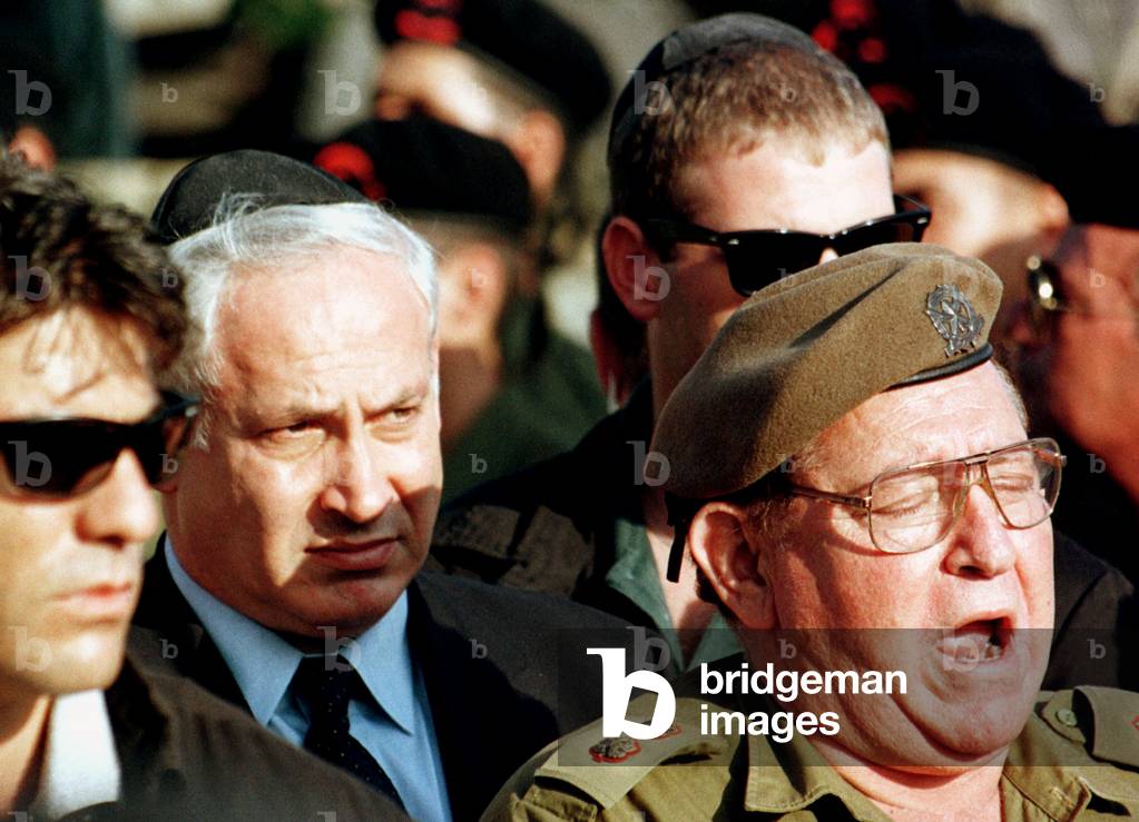 Image of Israeli Prime Minister Benjamin Netanyahu listens to an ...
