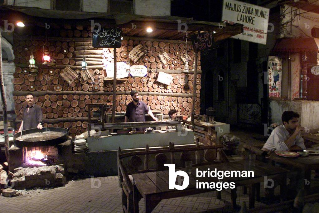 Image of Peshawar's traditional food is made available at a wooden stall