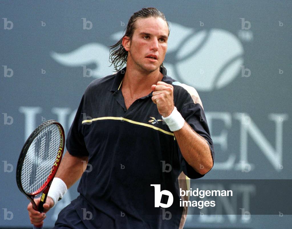 Image of Australian Patrick Rafter reacts to winning a point during the