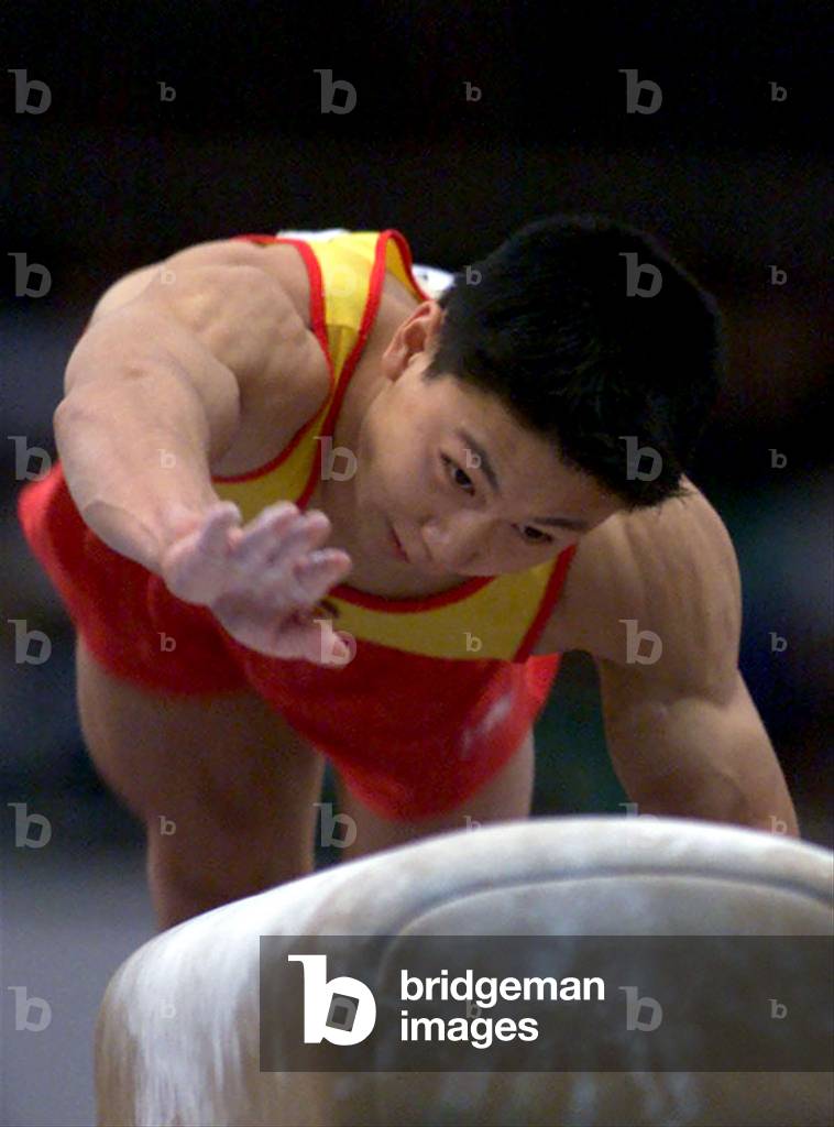 Image of CHINA'S LI XIAOPING PERFORMS ON VAULT AT INDIVIDUAL APPARATUS FINALS