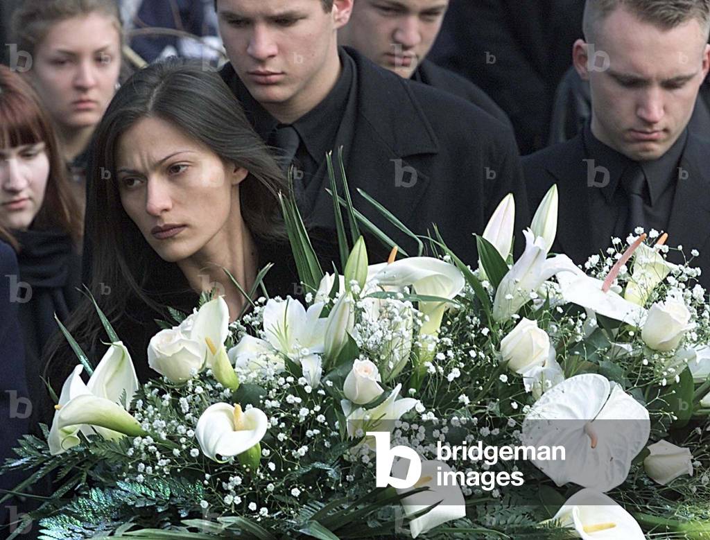 Image of SVETLANA RAZNATOVIC, WIDOW OF THE SERB WARLORD ARKAN CARRIES ...