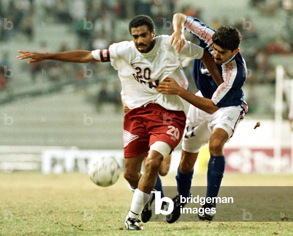 Image of QUATAR AND KUWAIT SOCCER AT ASIAN GAMES IN BANGKOK, 1998-12-14
