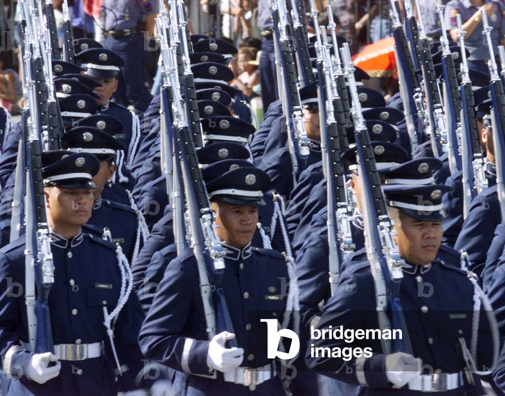 Image of FILIPINO SOLDIERS MARCH DURING THE 104TH ANNIVERSARY OF ...