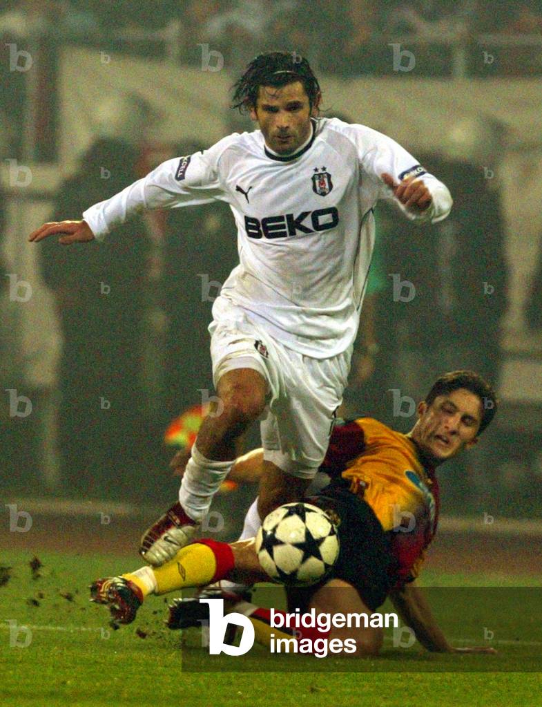 Image of BESIKTAS`S DEFENDER IBRAHIM UZULMEZ IS TACKLED BY GALATASARAY ...
