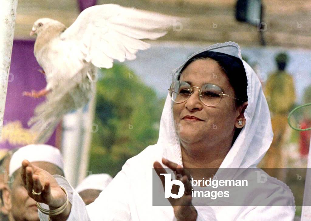 Image of Prime Minister Sheikh Hasina releases a white pigeon during the