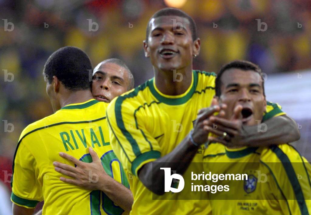 Image of BRAZILIAN TEAM MEMBERS CELEBRATE RIVALDO'S GOAL AGAINST ...