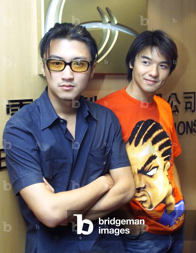 Image of HONG KONG POP SINGER-ACTOR NICHOLAS TSE AND STEPHEN FUNG POSE