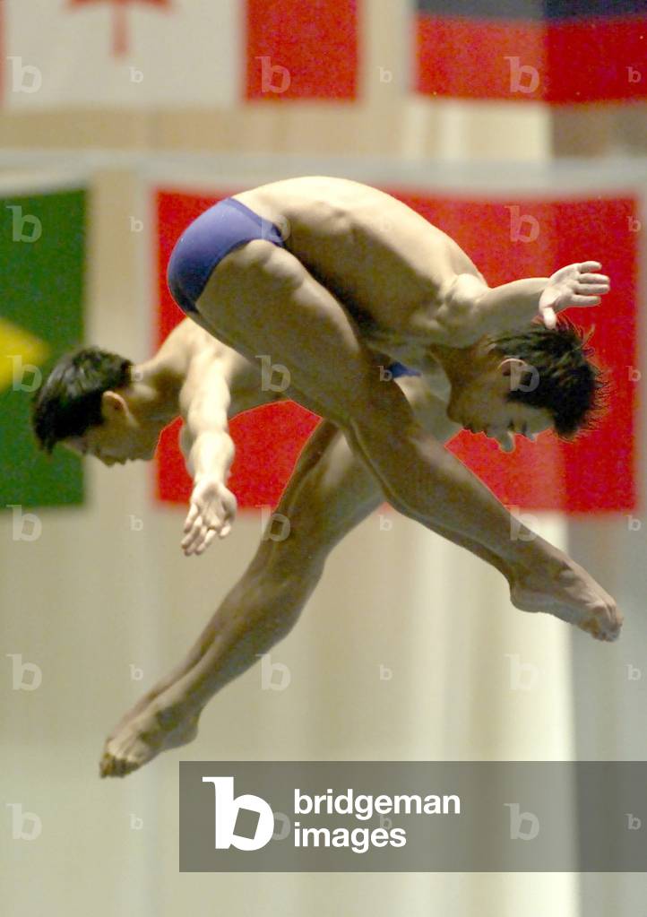 Image of CHINESE HU AND TIAN WIN GOLD MEDAL IN MEN'S SYNCHRO