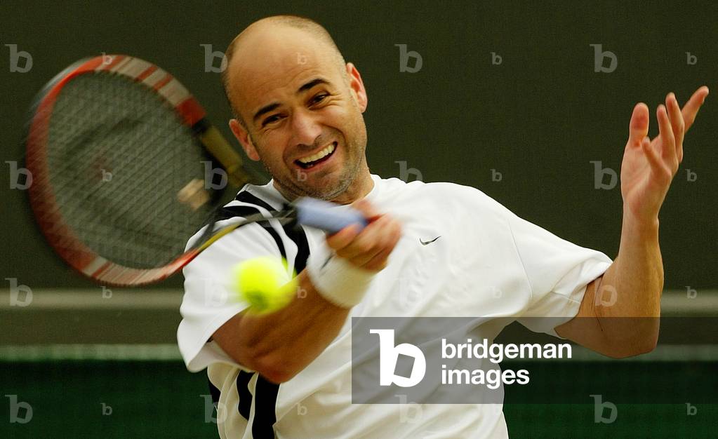 Image of AGASSI OF THE U.S. RETURNS TO AUSTRALIA'S PHILIPPOUSSIS T THE